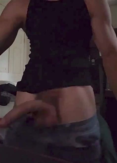 Muscled Hunk Pulls A Massive Uncut Cock From Trousers