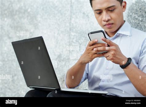 Software Developer Checking Messenger Stock Photo Alamy