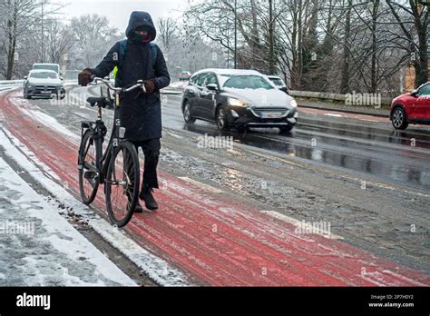 Cyclist Walking On Foot Holding Bicycle On Slippery Bike Path Cycle