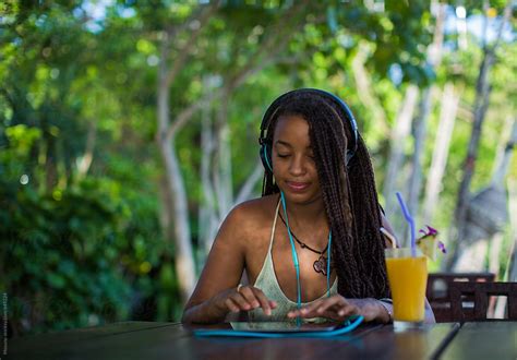 Mixed Race Woman Enjoying Holiday By Stocksy Contributor Mosuno