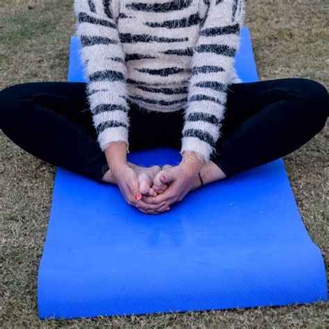 Portrait Of Gorgeous Young Indian Woman Practicing Yoga Outdoor In A