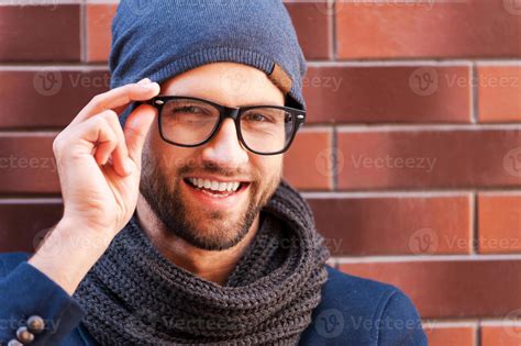 Confident Handsome Handsome Young Man In Smart Casual Wear Adjusting