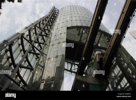 A Monorail Train Of Chongqing Light Rail Line Passes Through A Glass