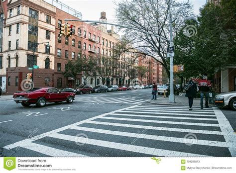 Manhattan Uptown Intersection With Light Cars And Crosswalk Editorial