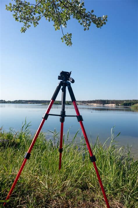 Camera Red Tripod Standing Near Lake Water Setup Stock Image Image Of Side Relax 188541411