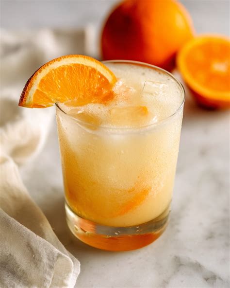 Creamy Orange Juice With Orange Zest Sugar Rim Refreshing And Easy
