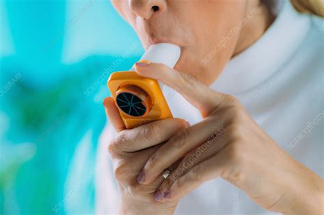 Woman Using Spirometer Stock Image F027 7002 Science Photo Library
