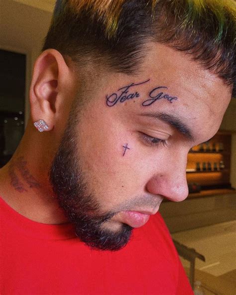 Anuel Neck Tattoo