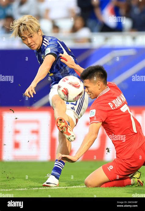 Japans Keito Nakamura L Scores A Goal During The Afc Asian Cup