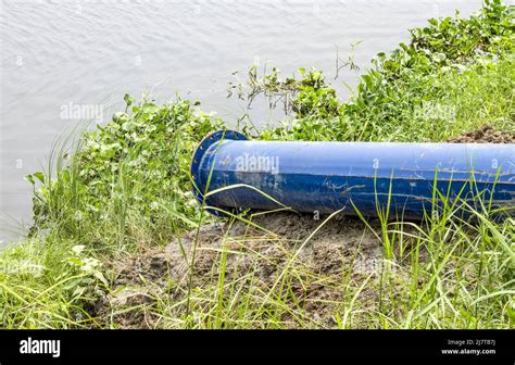 Endpoint Of A Dredging Pipeline Near The River Close Up Shot Stock