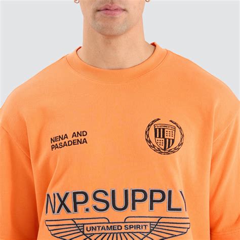 Nxp Golden Oversized Loopback Tee In Orange Neverland Store