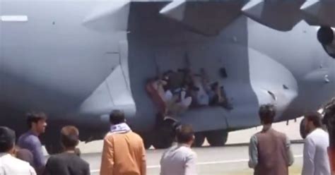Video Shows Afghans Clinging To Us Military Plane As It Takes Off In