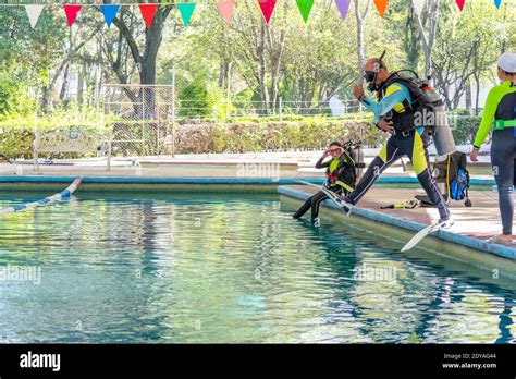 Teacher In Diving Classes Teaching How To Enter The Water Correctly