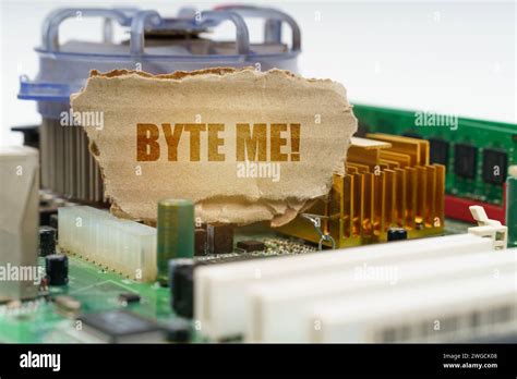 On The Computer Motherboard There Is A Cardboard With The Inscription Byte Me Computer