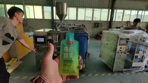 全自动四边封食品给袋式包装机颗粒粉剂液体称重往复式给袋机 阿里巴巴
