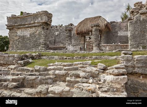 Side View Of The Remains Of A Small Mayan Temple In The Tulum Complex