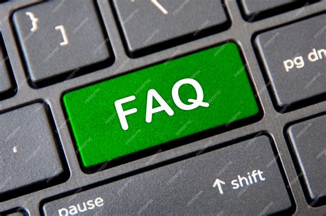 Premium Photo Frequently Ask Question Concept Laptop Keyboard With Green Faq Button