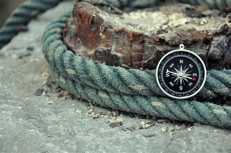 Premium Photo Close Up Of Navigational Compass On Rope