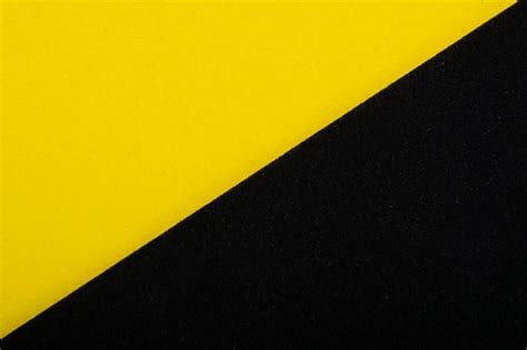 Premium Photo Bright Yellow And Black Color Paper Texture Background