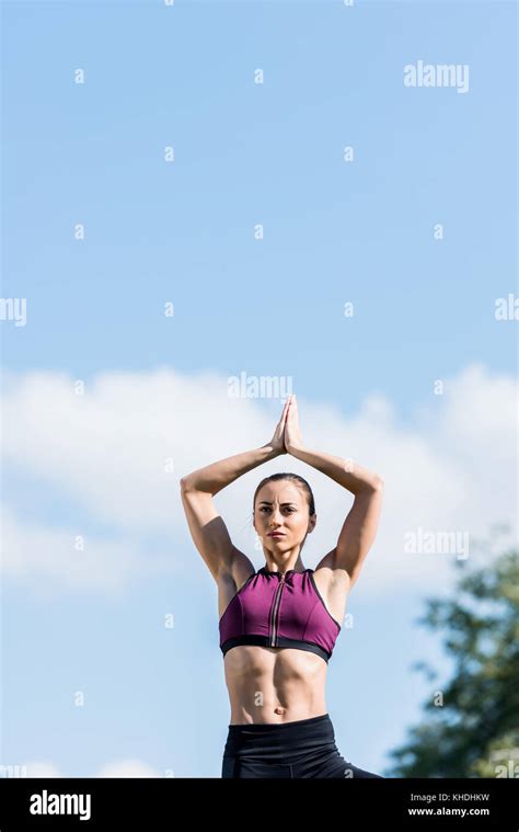 Woman In Tree Pose Stock Photo Alamy Woman In Tree Pose Stock Photo Alamy