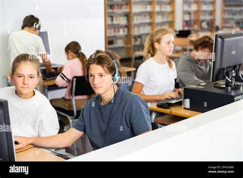 Teenagers In Computer Class Stock Photo Alamy