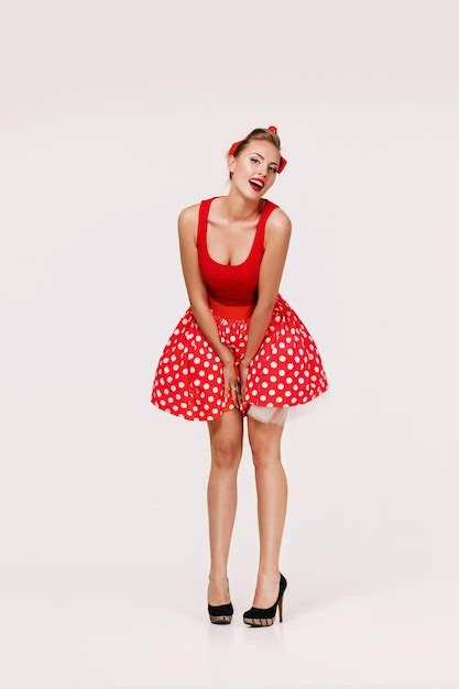 Premium Photo Smiling Pin Up Woman In Polka Dot Red Dress