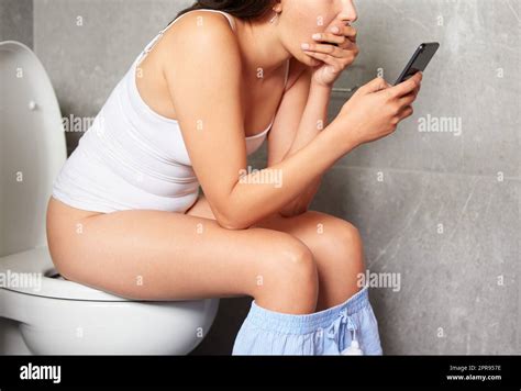Female Using Bathroom