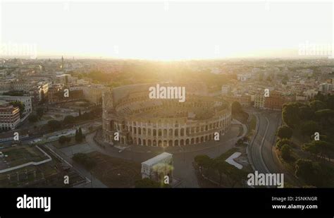 Sunrise Over Colosseum Golden Light Illuminating Ancient Roman