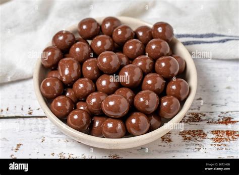 Chocolate Coated Hazelnut Dragee Hazelnut Dragee Chocolates On A White