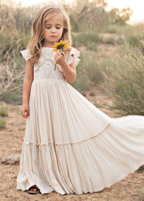 26 Boho Flower Girl Dresses That Will Match Your Laid Back Wedding