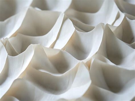 Abstract Folded Texture With Sharp Intersecting Angles Creating A Modern Geometric Surface In