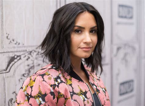 Demi Lovato Poses In White Lingerie And Teases Big News