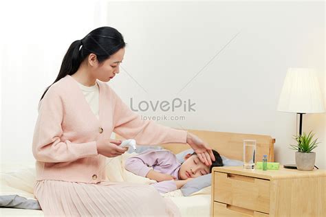 Mother Feeling Daughters Body Temperature Picture And Hd Photos Free