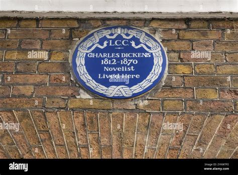 Blue Plaque Commemorating Charles Dickens On A Brick Wall Charles
