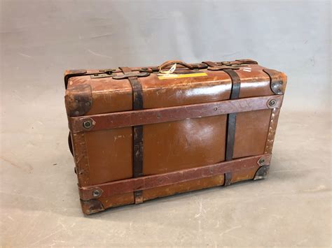 An Osilite Suitcase By H J Cave And Sons The Leather Cornered Lid 75 X
