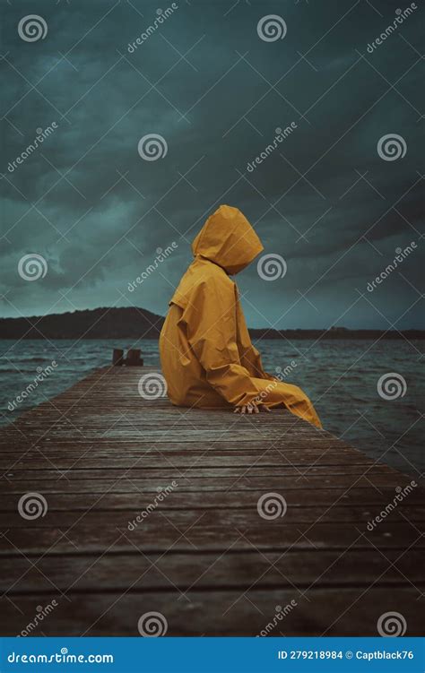 A Mysterious Figure Standing By A City Street Light On A Moody Foggy