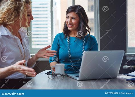 Shes Full Of Brand New Ideas Two Businesswomen Using A Laptop Together