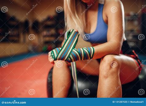 Female Kickboxer Sitting On Punching Bag In Gym Stock Image Image Of
