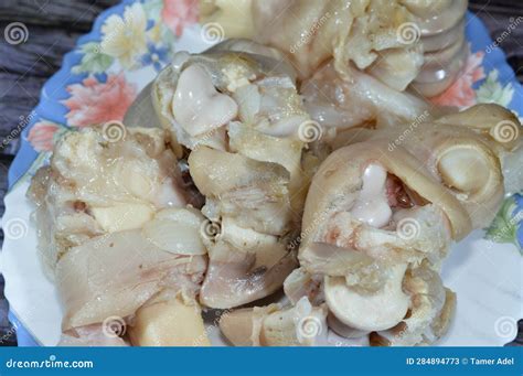 Arabic Egyptian Cuisine Of Kawareh Trotters With Its Traditional Soup