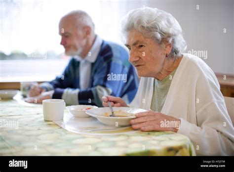 Two Women Eating Soup Hi Res Stock Photography And Images Alamy