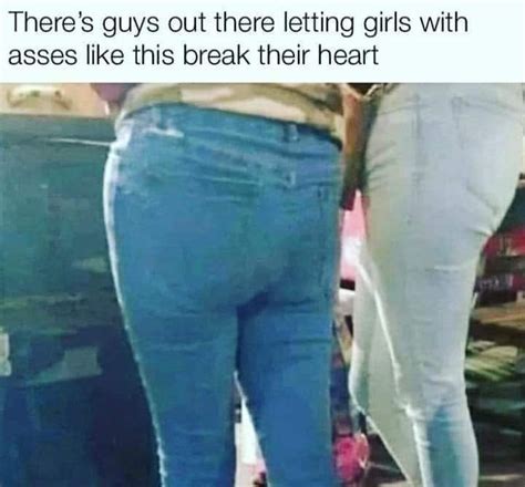 Two Women Standing Next To Each Other With Their Butts Exposed And