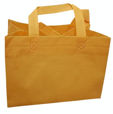 Mustard Yellow Loop Handle Non Woven Bag At Rs 230kg Tal Katora