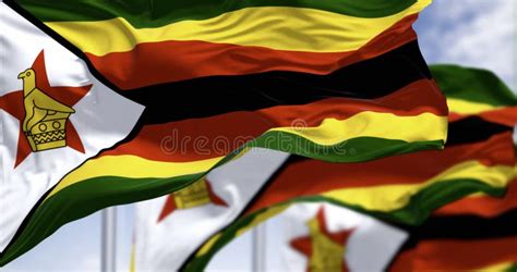 Close Up View Of The Zimbabwe National Flags Waving In The Wind Stock