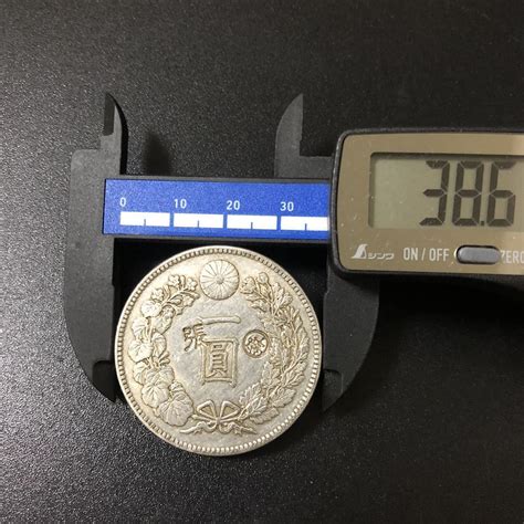 Yahooオークション 銀貨 一円銀貨 一圓 明治16年 荘印付き 大日本