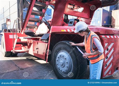 Caucasian Female Engineer Checking Container Forklift For Work Safety At Workplace Is Containers