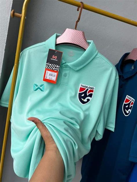 เสื้อโปโล Warrix Pinพร้อมโลโก้ใหม่สี Th
