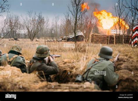 Re Enactors Armed Rifles And Dressed As World War Ii German Wehrmacht