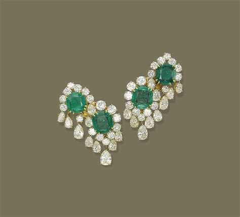 A PAIR OF EMERALD AND DIAMOND EAR PENDANTS BY VAN CLEEF ARPELS