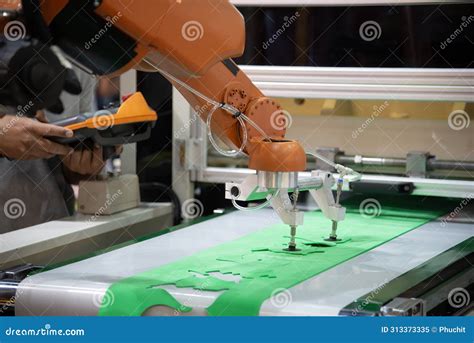 the engineer program the robotic arm stock image image of engineer