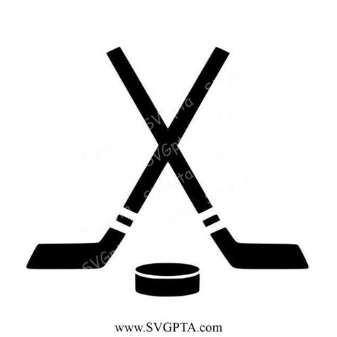 Two Crossed Hockey Sticks And Puck